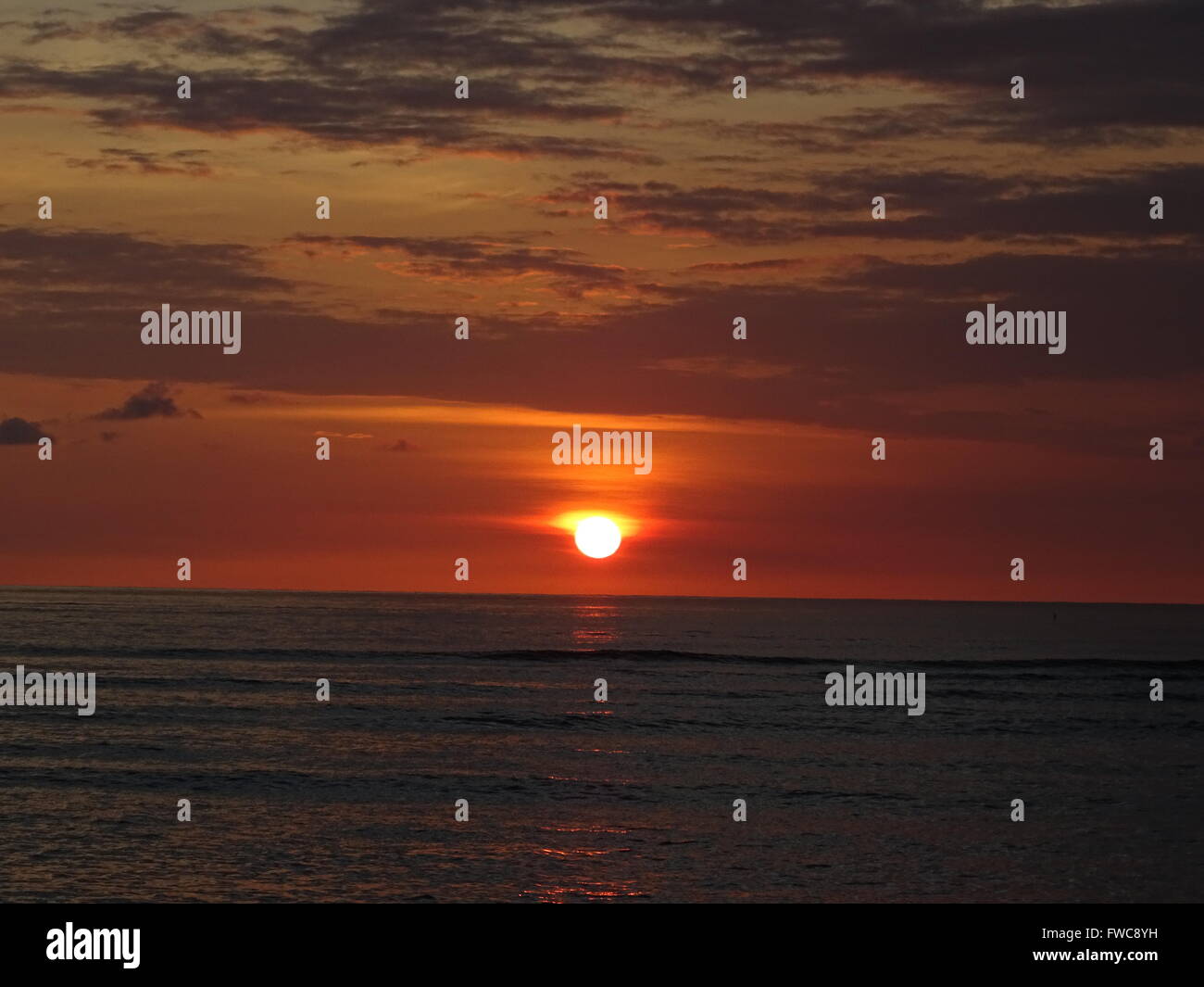 sunset in the ocean Stock Photo - Alamy