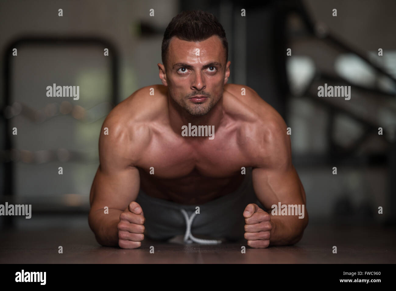Young Man Athlete Doing Pushups As Part Of Bodybuilding Training Stock ...