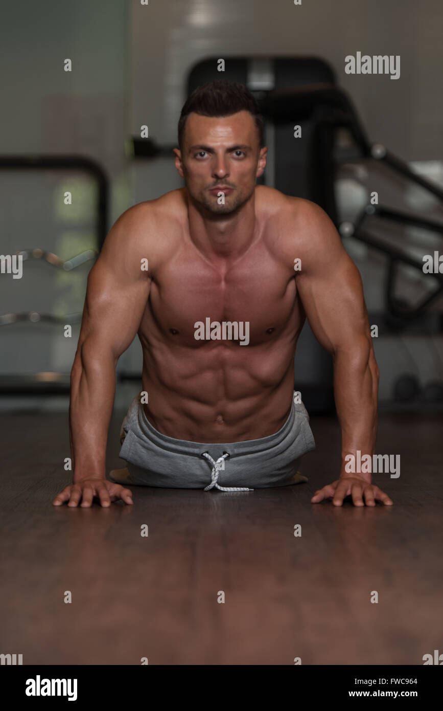 Young Man Athlete Doing Pushups As Part Of Bodybuilding Training Stock ...