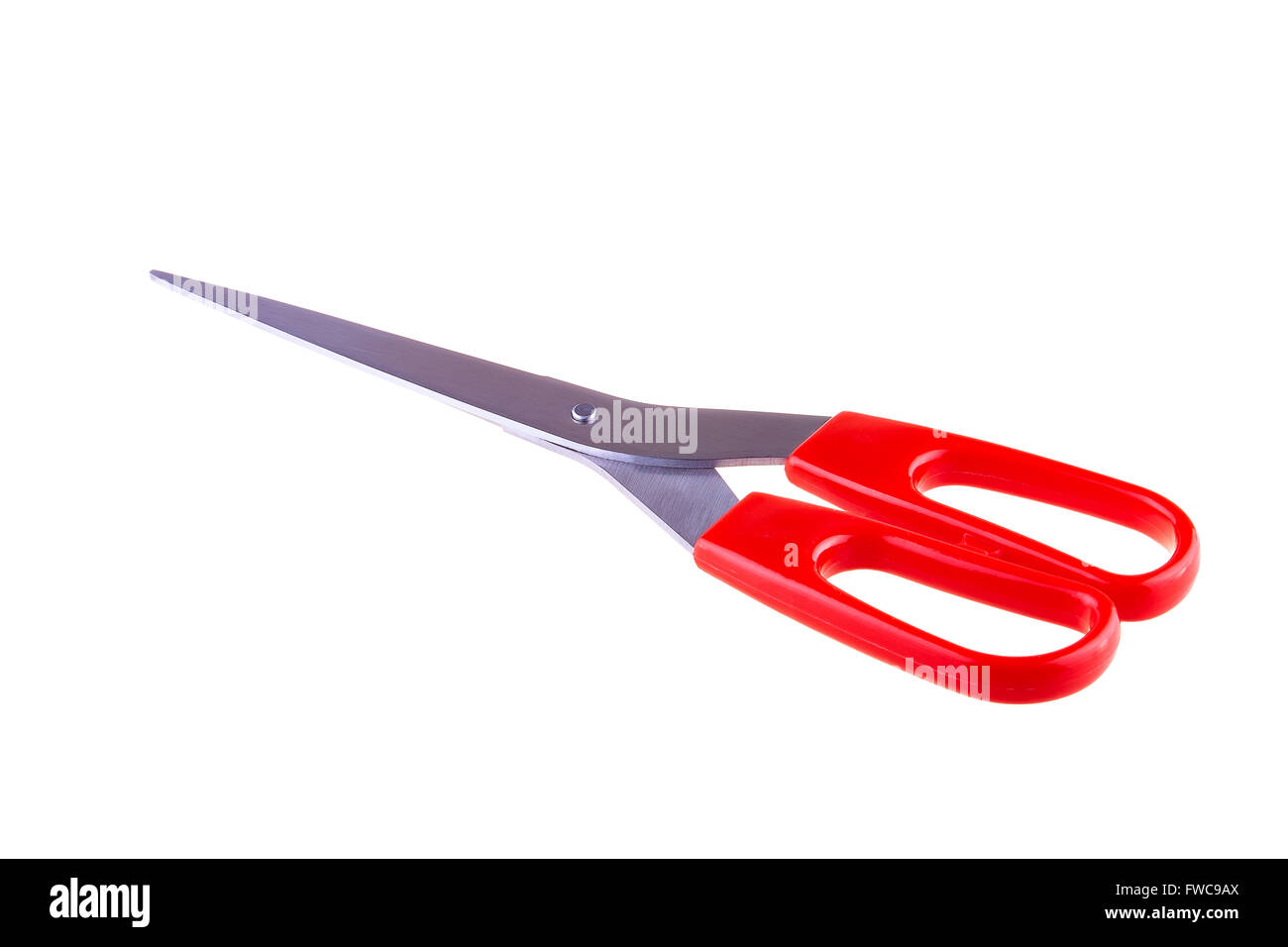 Red Scissors isolated on a white Stock Photo - Alamy