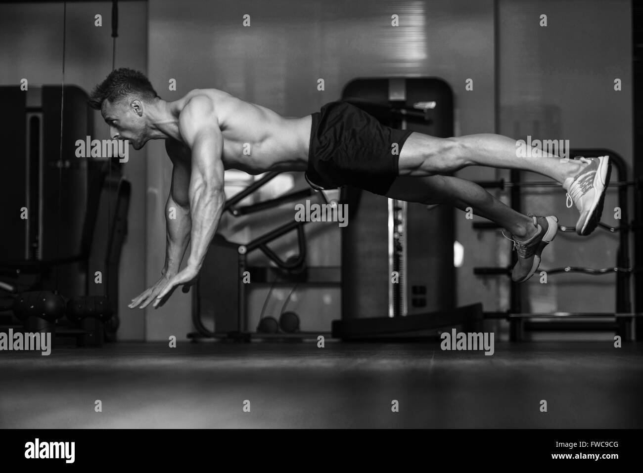 Young Man Athlete Doing Extreme Pushups As Part Of Bodybuilding ...