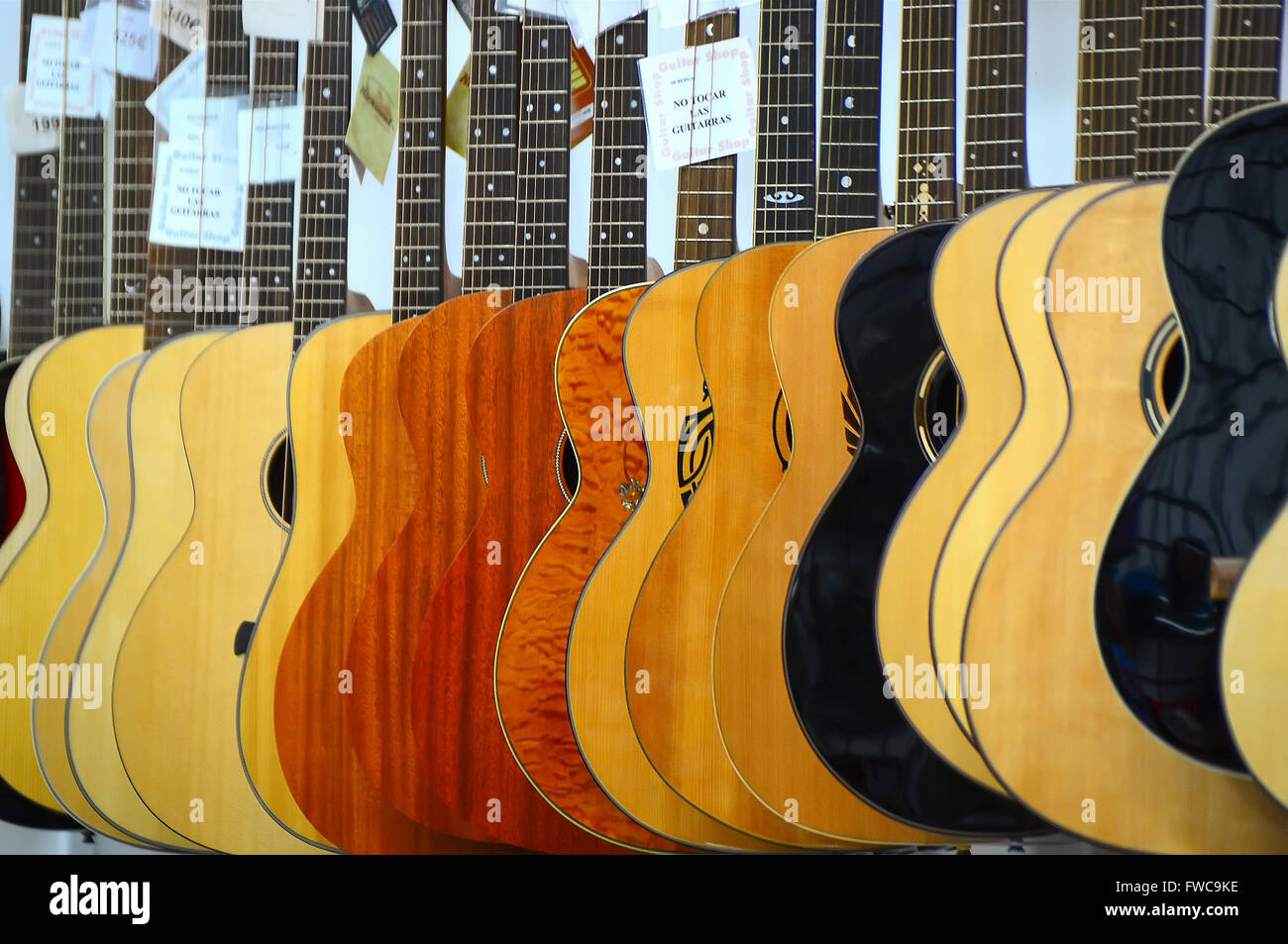 Classic guitars in the shop Stock Photo - Alamy