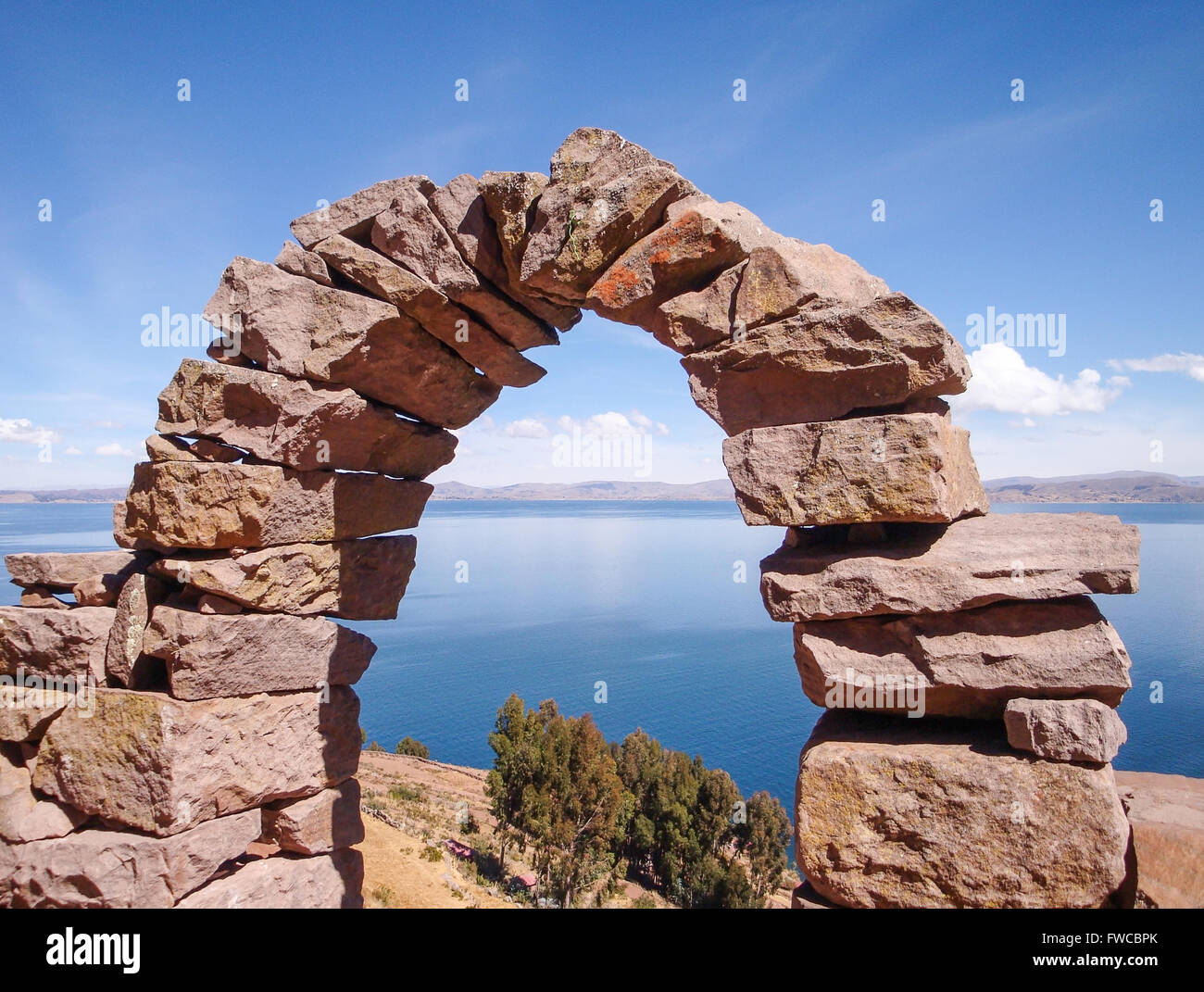 andes scenery with arch made of stone at Lake Titicaca in Peru (South ...