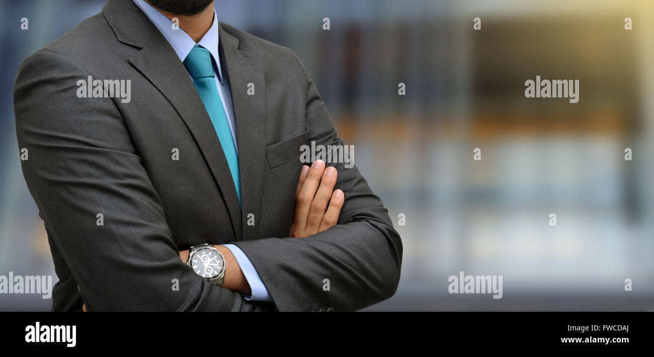 Professional Business man standing in front of office building Stock ...