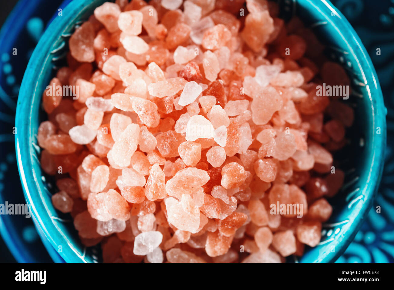 Himalayan Pink Salt Crystals Close Up in a Blue Ceramic Authentic Bowl ...