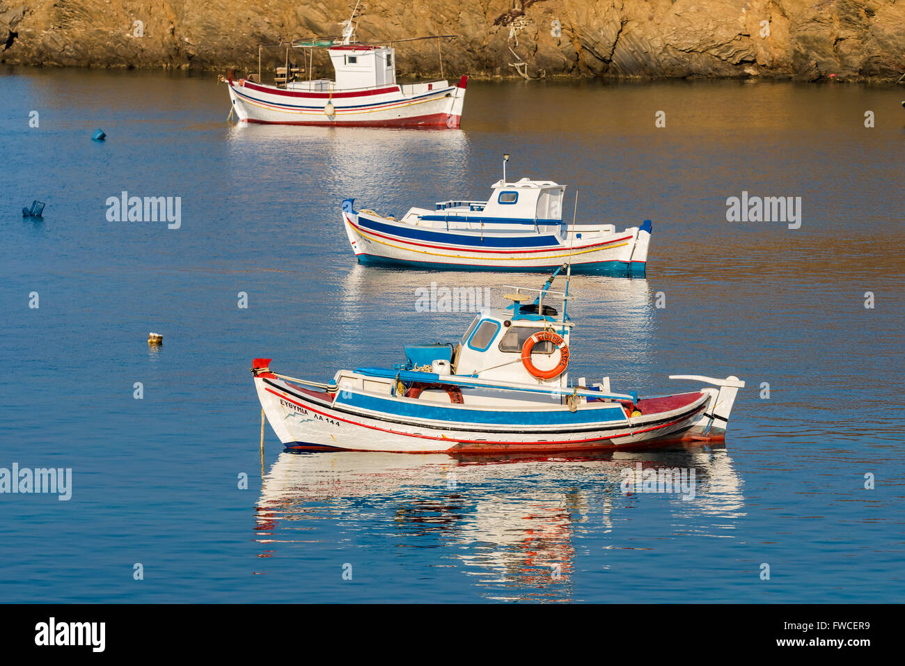 Traditional greek fishing boats in Astypalaia island Greece Stock Photo ...