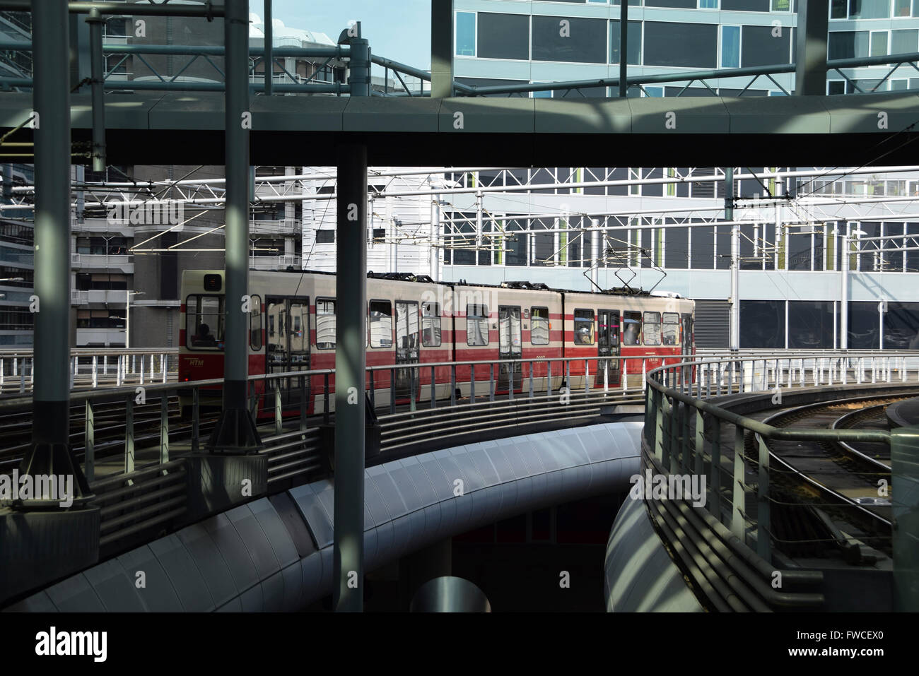 HTM tram leaving the upper level of the Den Haag Centraal tram terminal ...