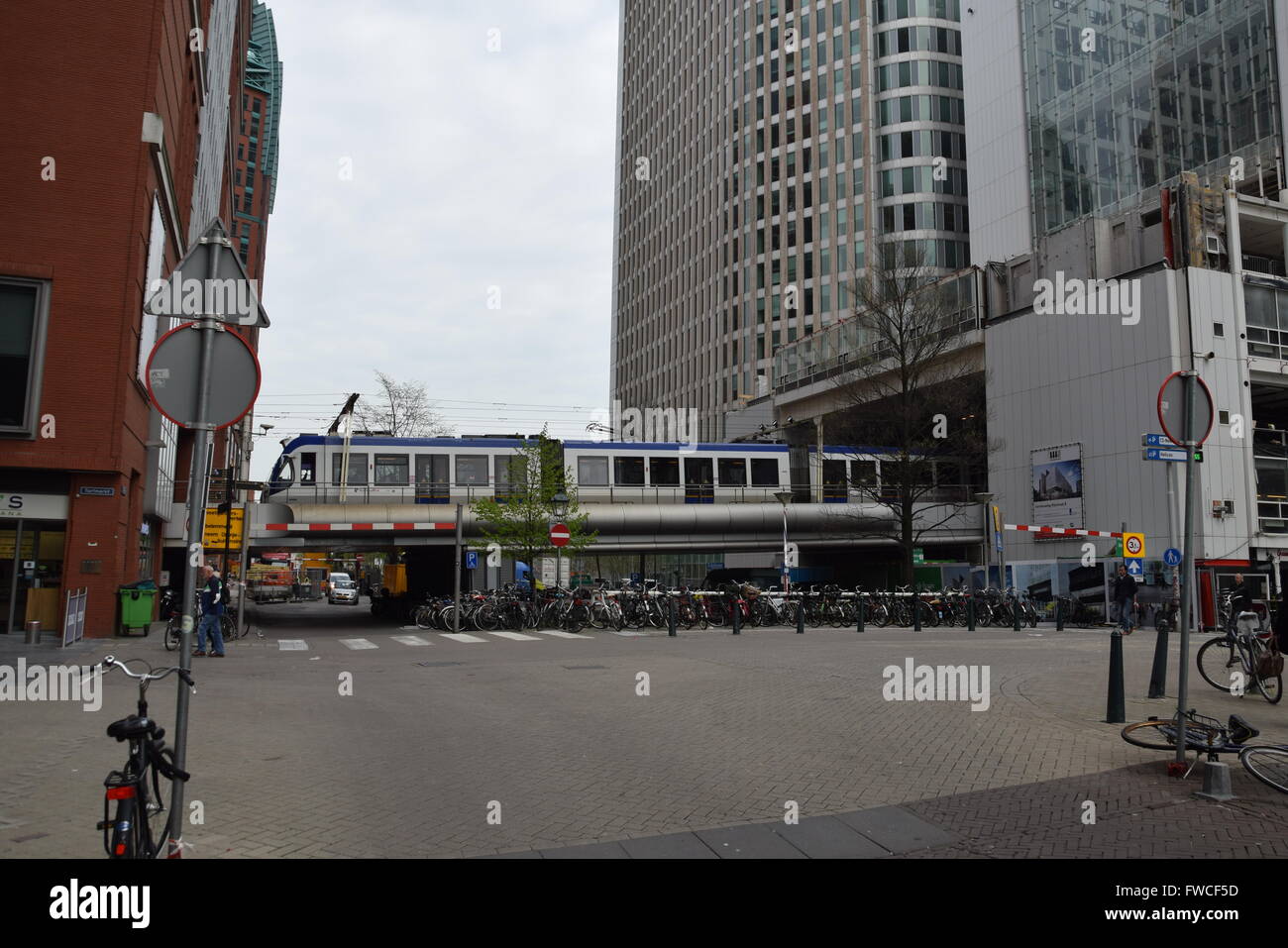 Randstadrail tram on an elevated bridge over a kanal near Den Haag ...