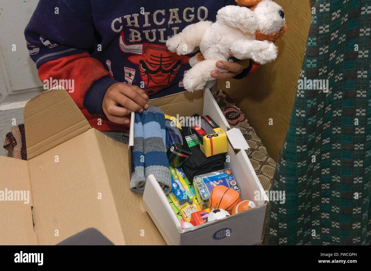 Poor families in the former Soviet Union accept charity donations from ...