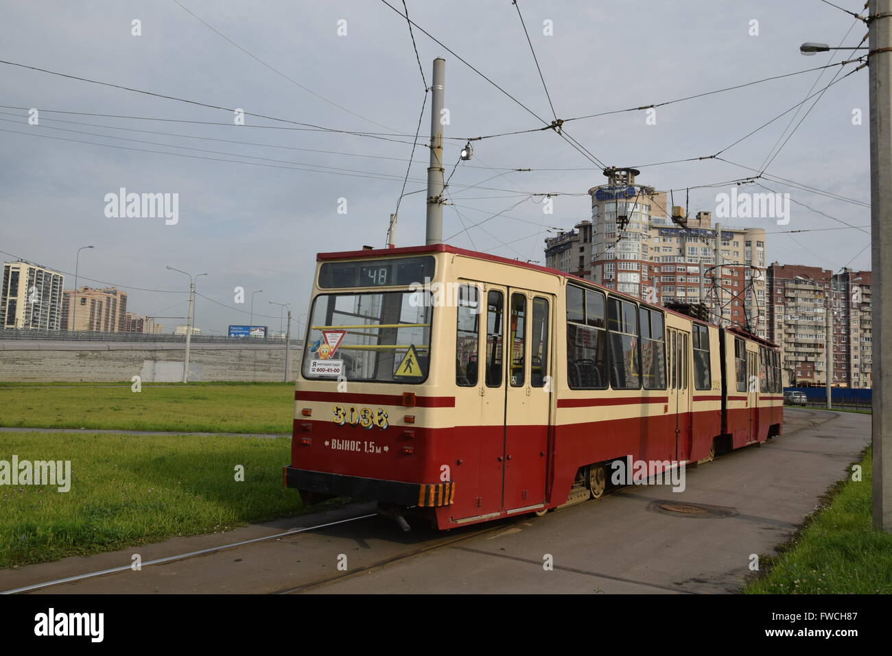 Tram of Route 48 entering the track fan of the Lakhtinsky Razliv ...