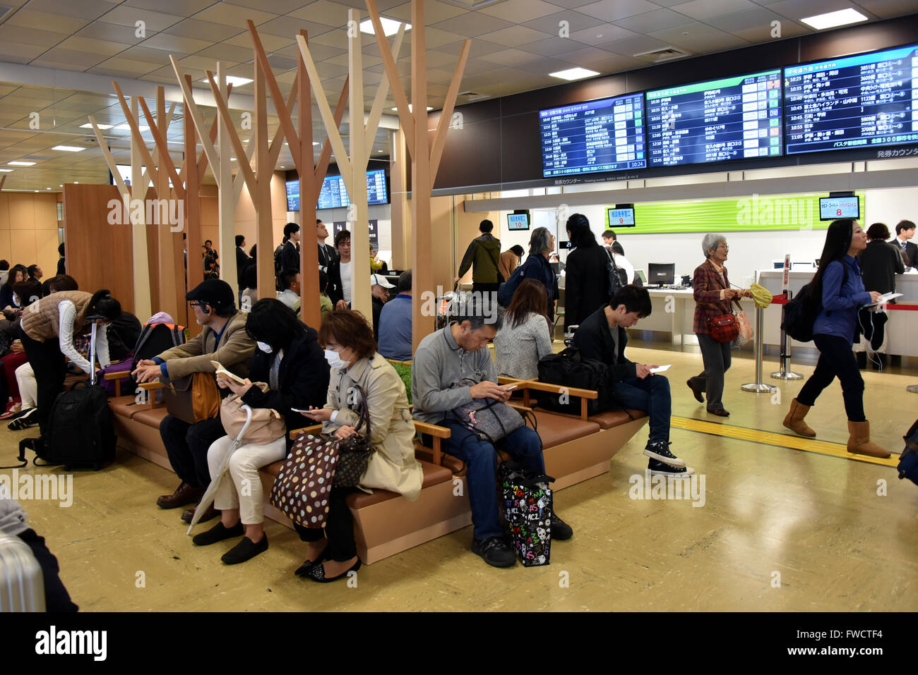 Monday. 4th Apr, 2016. Travelers mill around the departure lobby of the ...