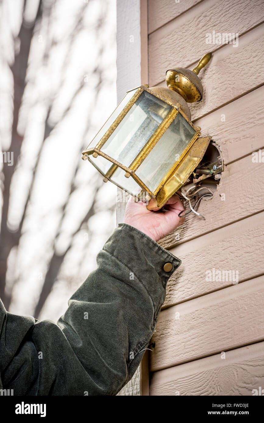 Repairman replace hi-res stock photography and images - Alamy