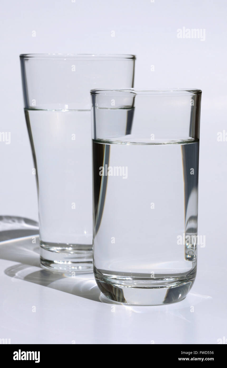 Drinking Water In Glass On White Background Stock Photo - Alamy