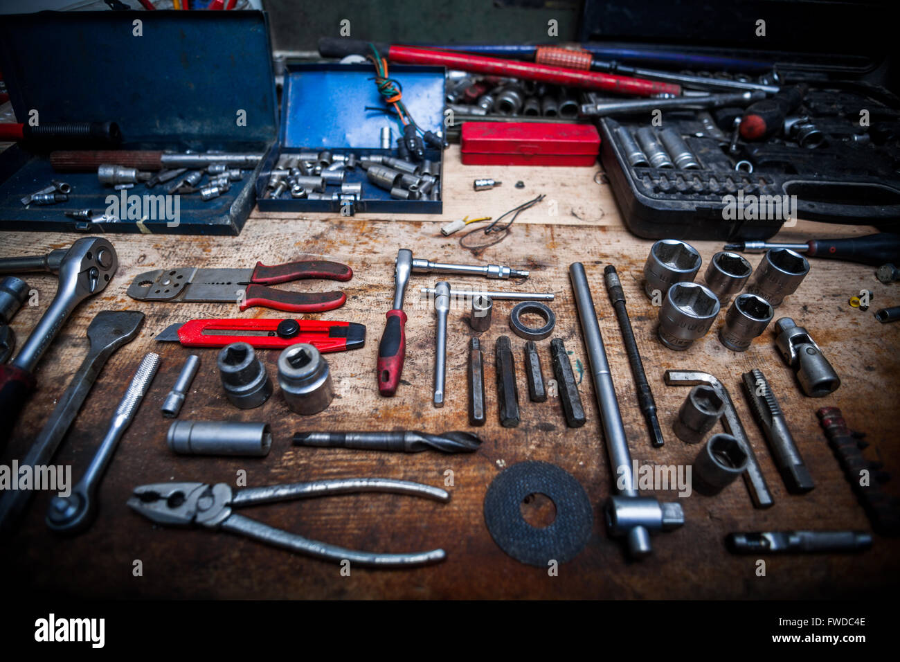 Color image of many tools on a wooden plank Stock Photo - Alamy