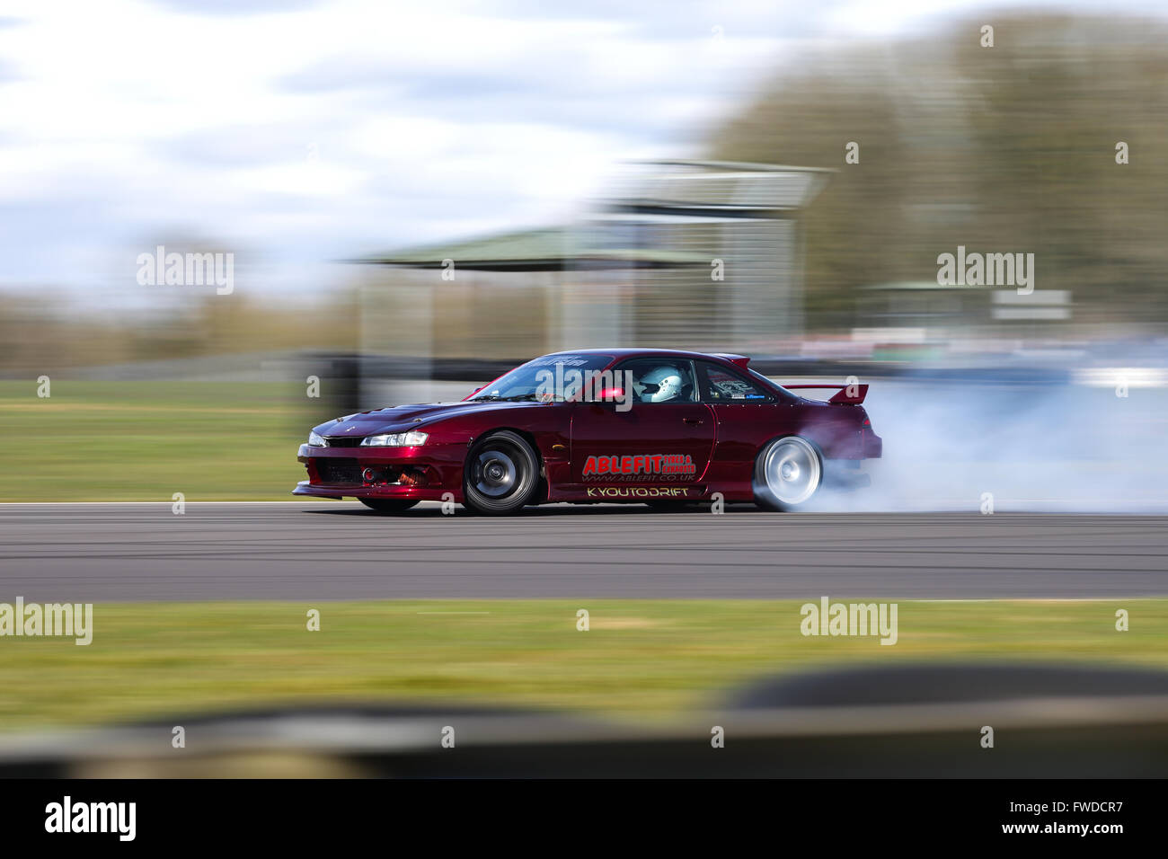 A drift car on track at Castle Combe Circuit Stock Photo - Alamy