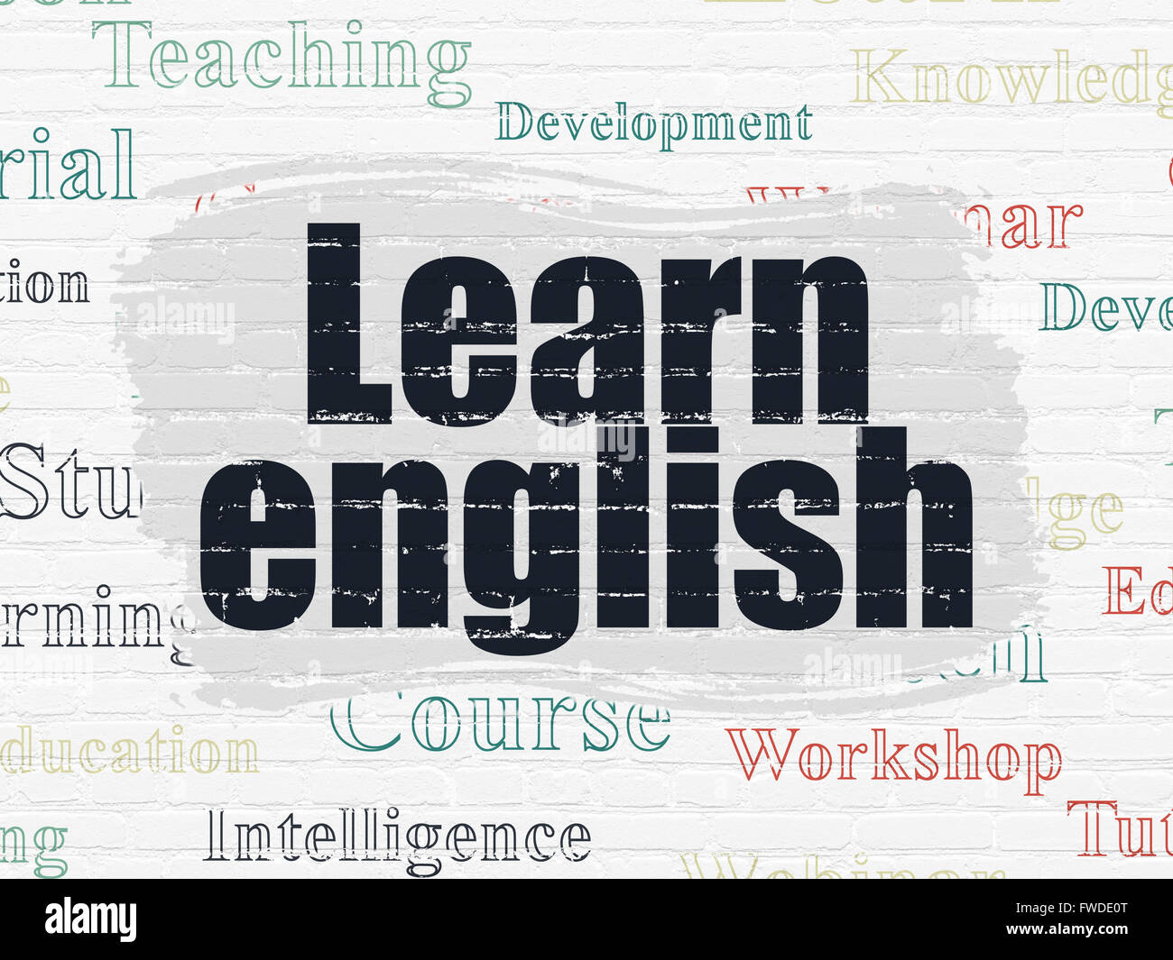 Studying concept: Learn English on wall background Stock Photo - Alamy