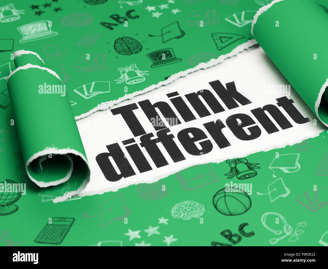 Learning concept: black text Think Different under the piece of torn ...