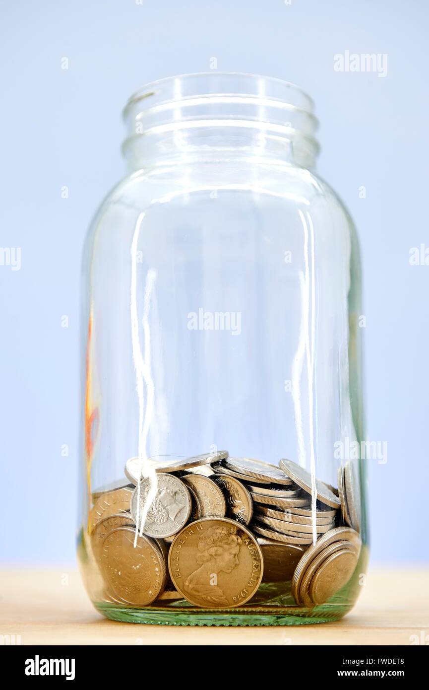 A studio photo of a money jar Stock Photo - Alamy