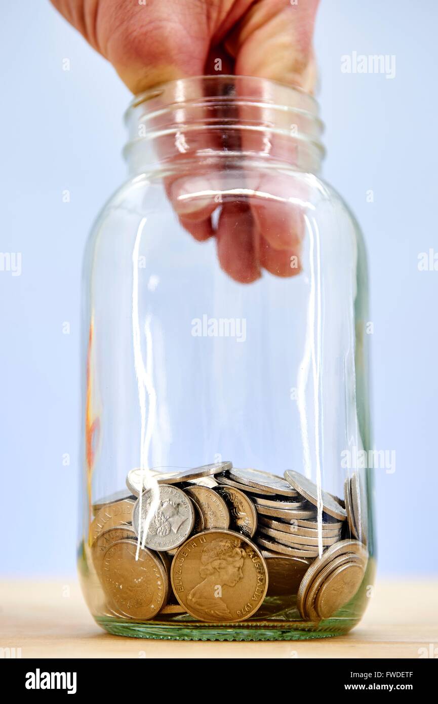 A studio photo of a money jar Stock Photo - Alamy