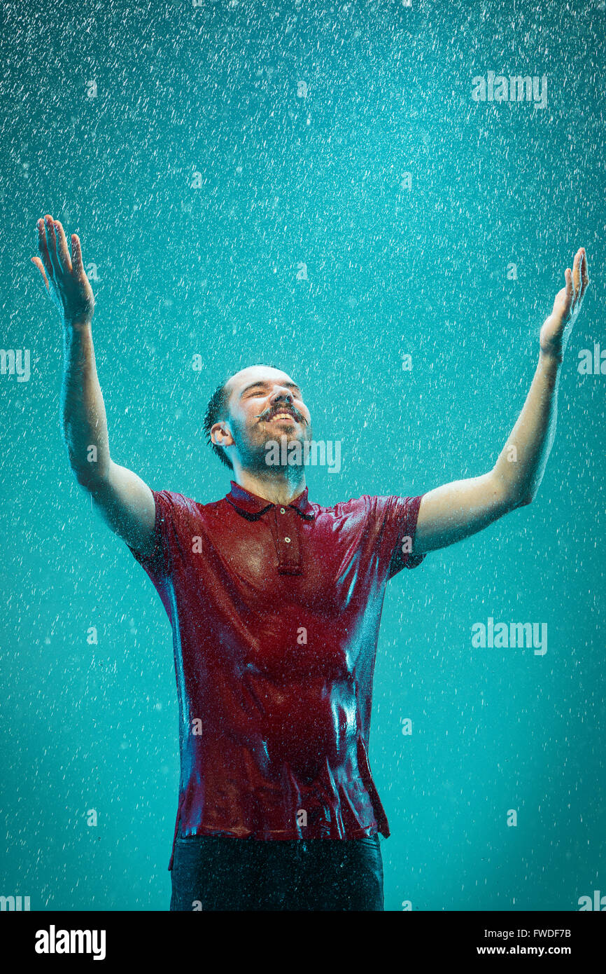Wet man smile rain one hi-res stock photography and images - Alamy