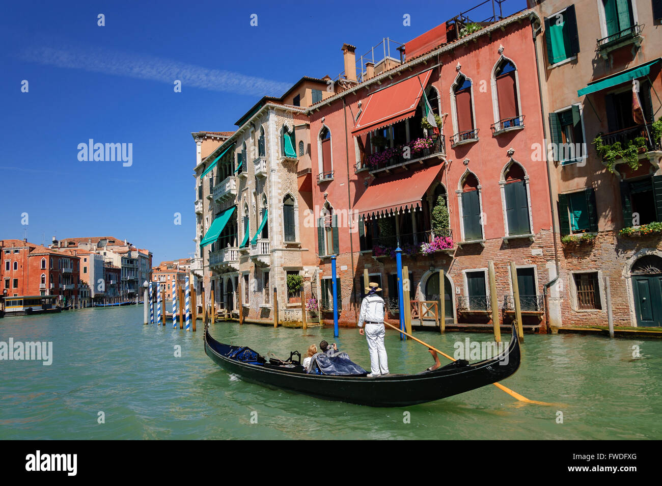 Romantic gondola ride viewing beautiful architecture along the Grand ...