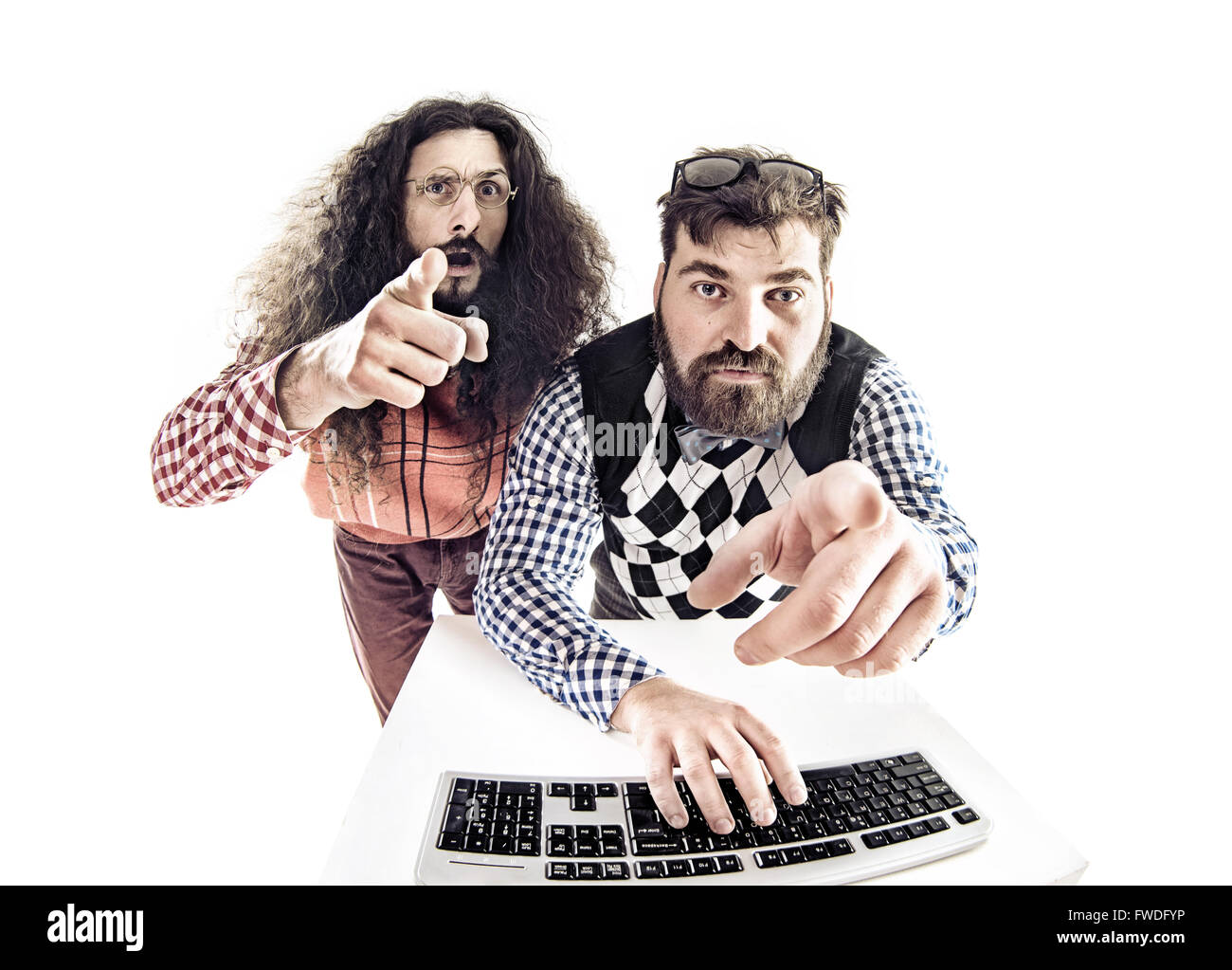 Two hilarious guys staring at the monitor Stock Photo - Alamy