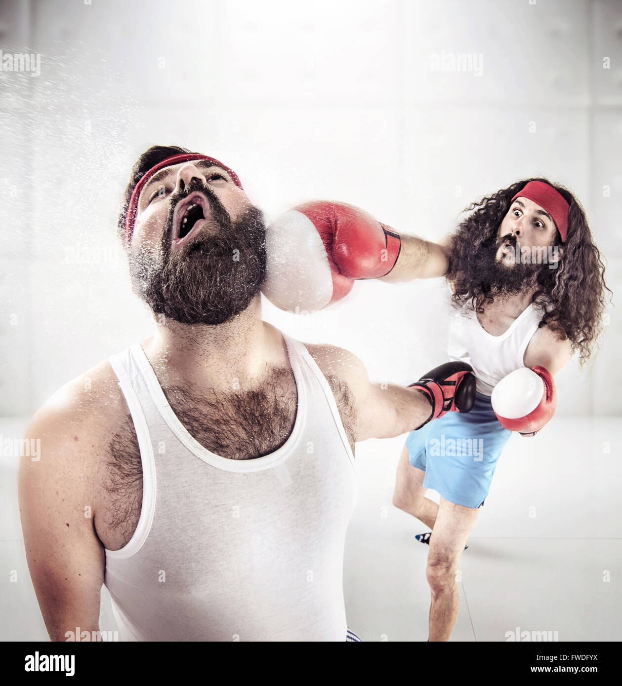 Two nerdy pals boxing on the ring Stock Photo - Alamy