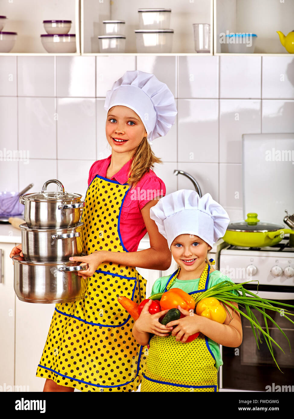 Child cooking at kitchen Stock Photo - Alamy
