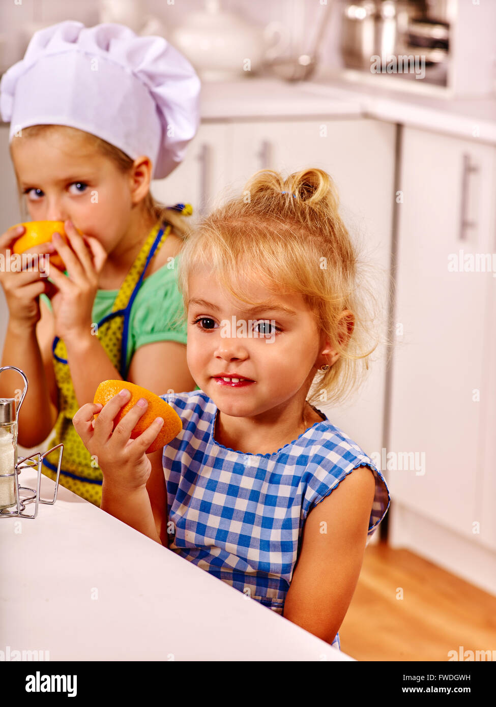 Children breakfast at kitchen Stock Photo - Alamy