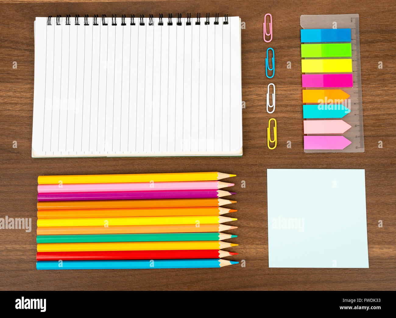 Open notebook with stationary Stock Photo - Alamy