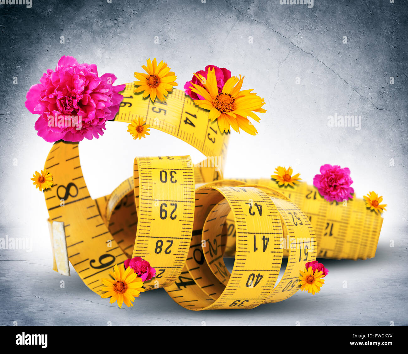 Measuring tape with flowers Stock Photo - Alamy