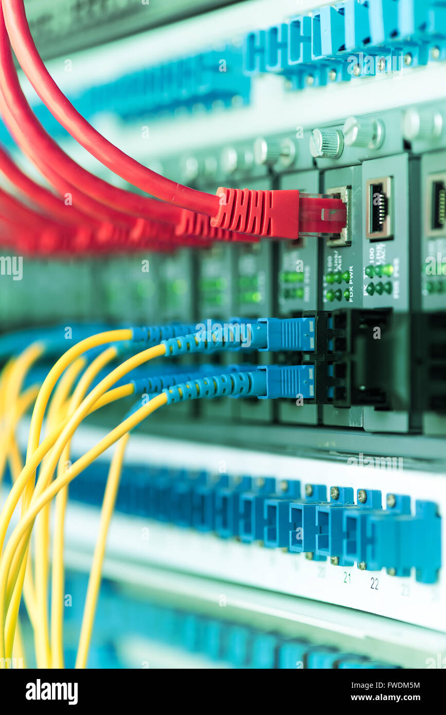 Fiber optic connecting on core network swtich Stock Photo - Alamy