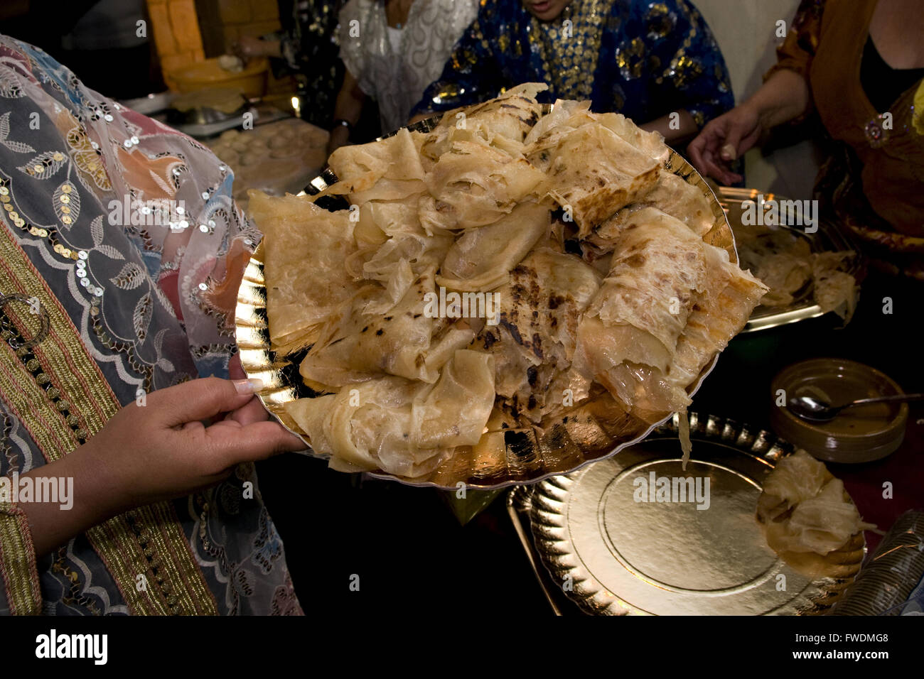 A traditional Morroccan Jewish mufleta creps during the Mimunah ...