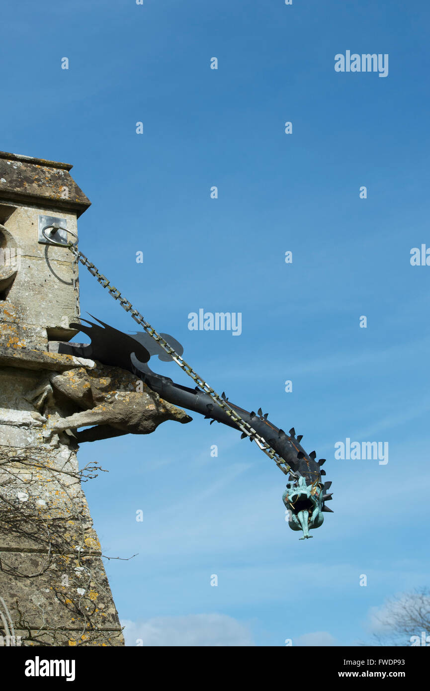 Contemporary dragon gargoyle at St Nicholas Church, Hatherop, Gloucestershire, England Stock ...