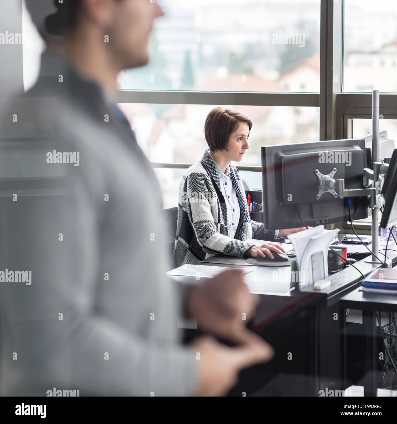 Personal assistant working in corporate office Stock Photo - Alamy