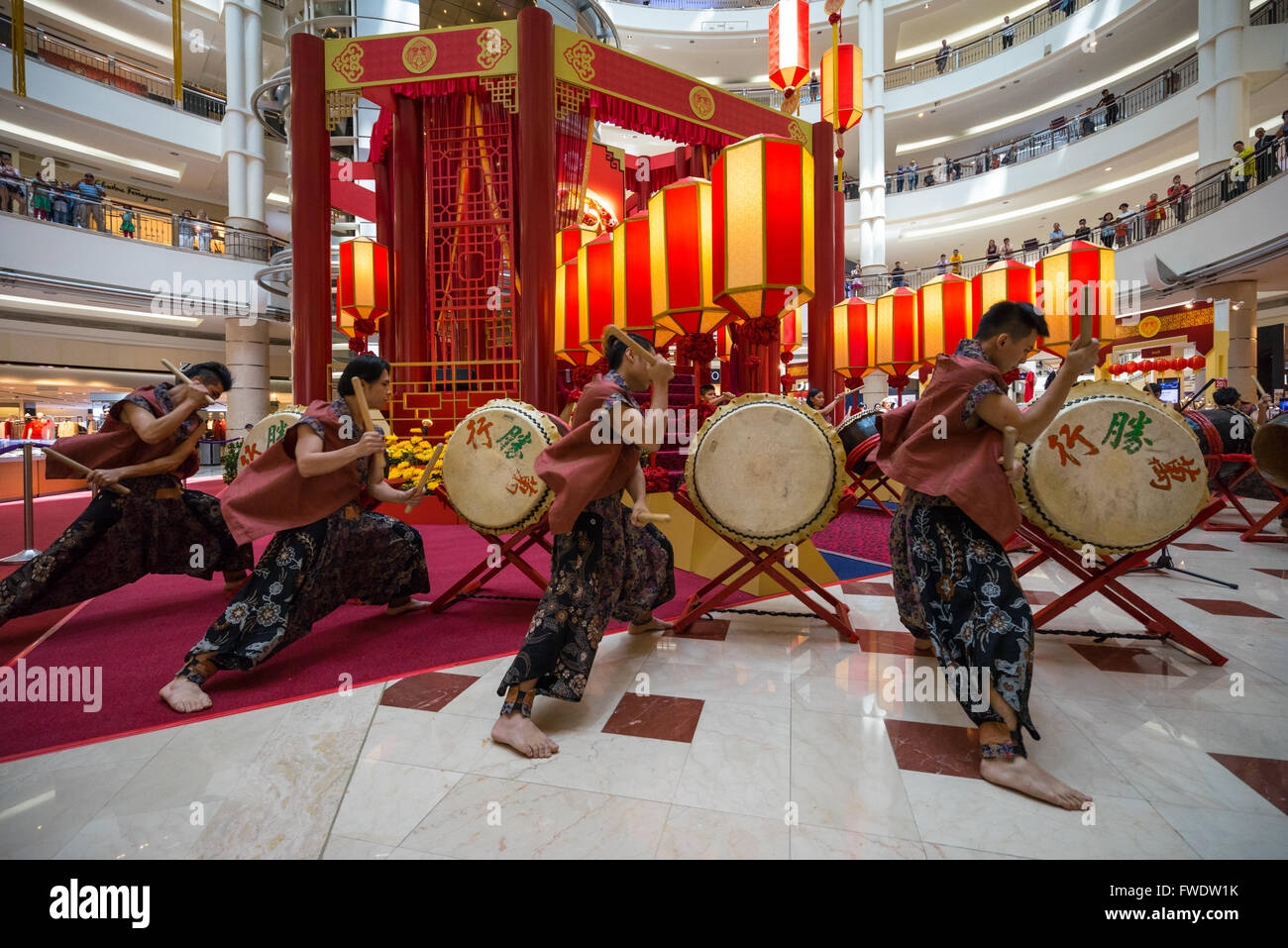 Drum performer as part of lion dance in Kuala Lumpur City Centre mall ...
