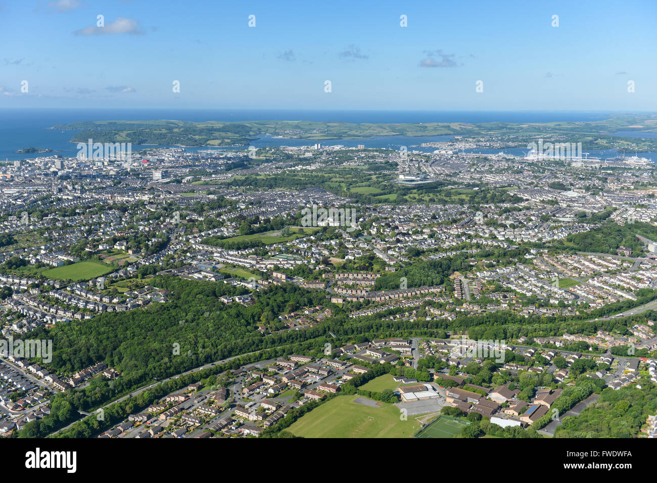 Wide aerial views of the Devon city of Plymouth with the sea visible in ...