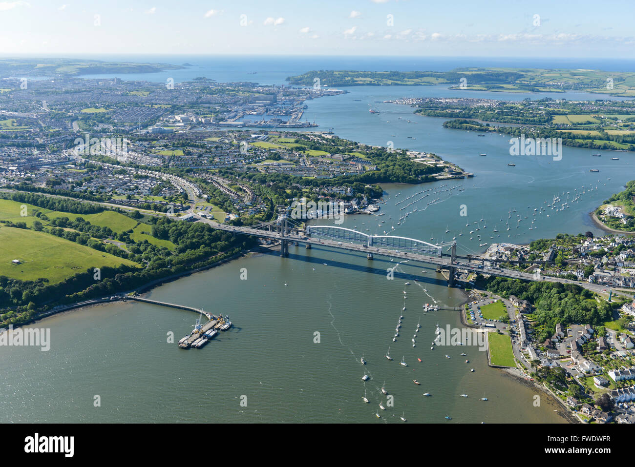 An aerial view of the Tamar Estuary with the road and railway bridges ...