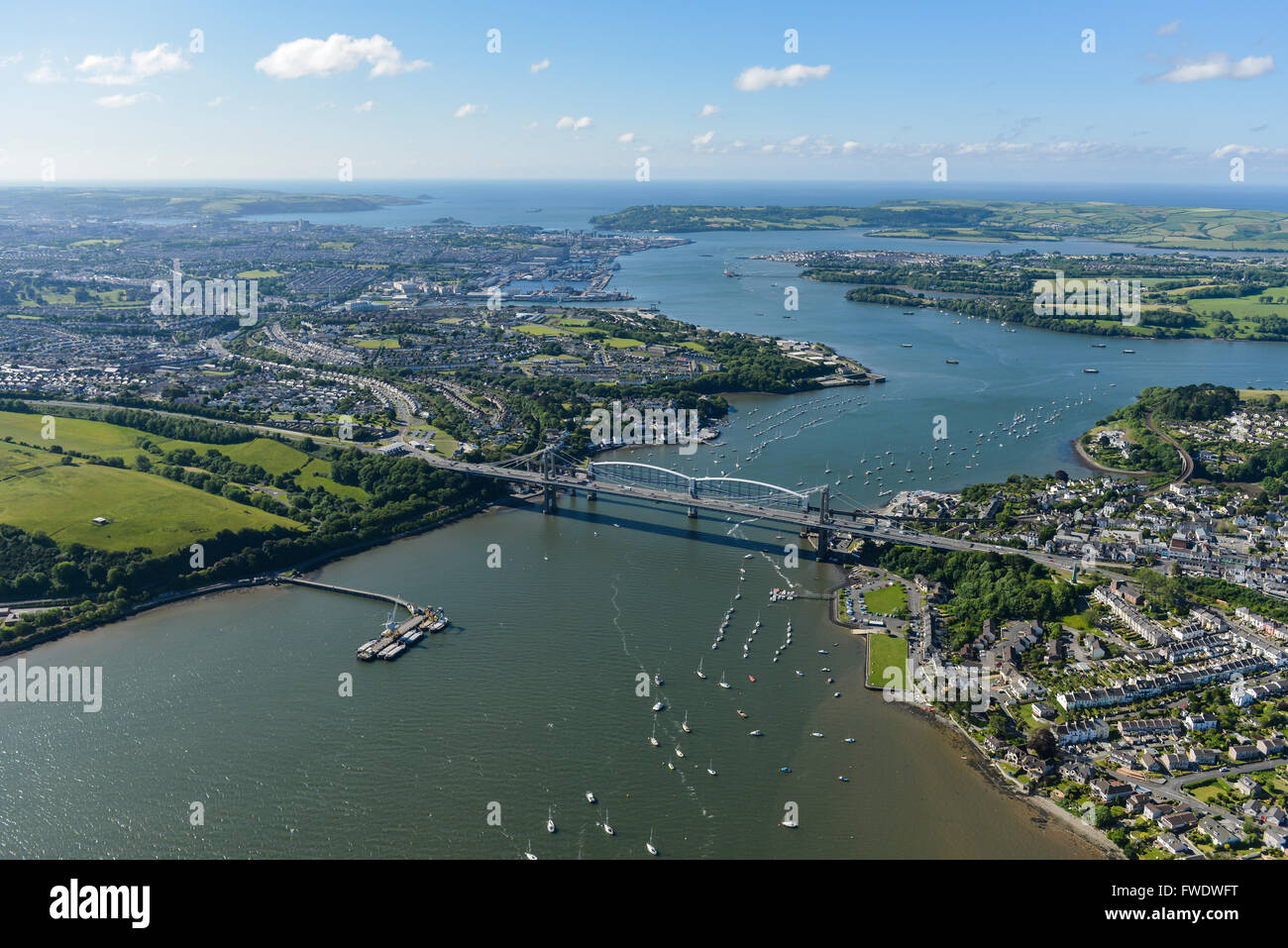 An aerial view of the Tamar Estuary with the road and railway bridges ...
