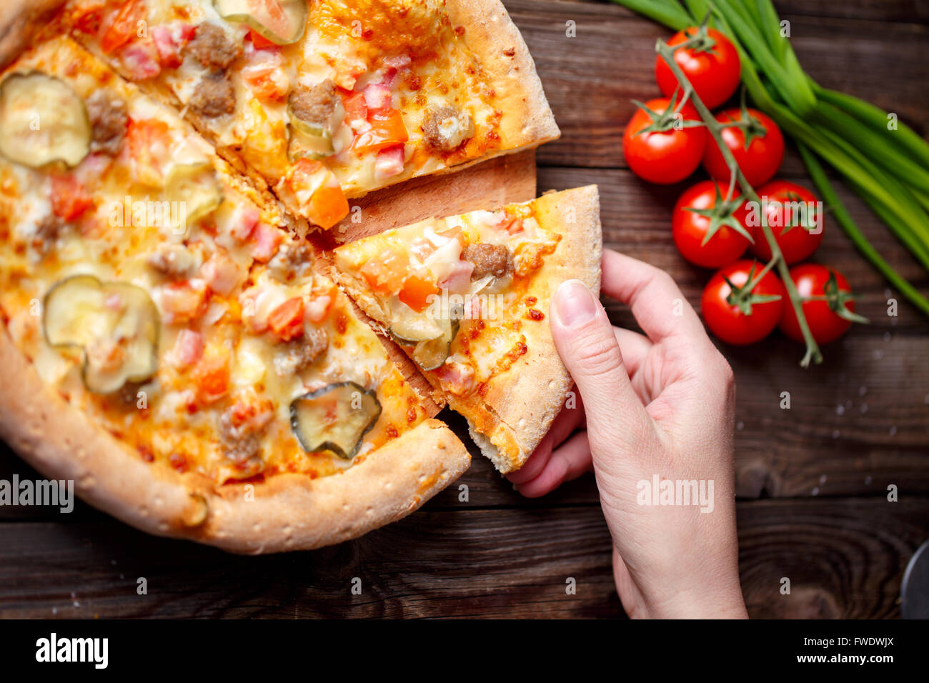 Man hand take slice pizza hi-res stock photography and images - Alamy