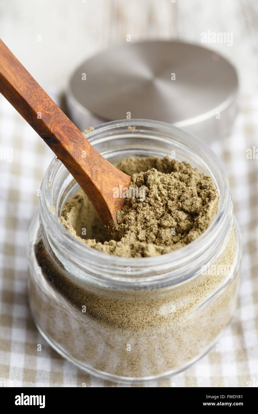 A glass jar of protein-rich hemp seed powder Stock Photo - Alamy