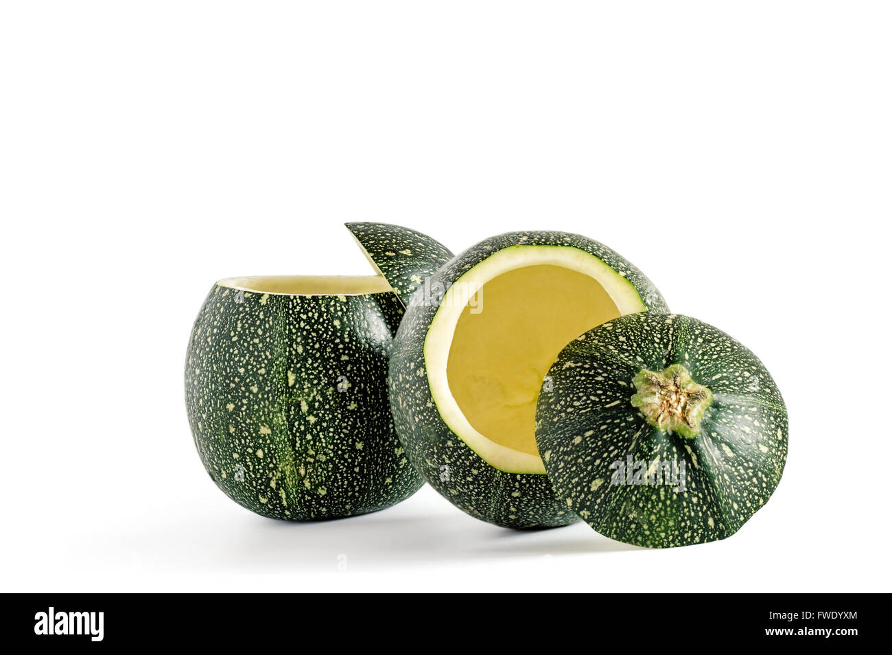 Couple of eight ball squash with cut top and scooped out pulp isolated ...