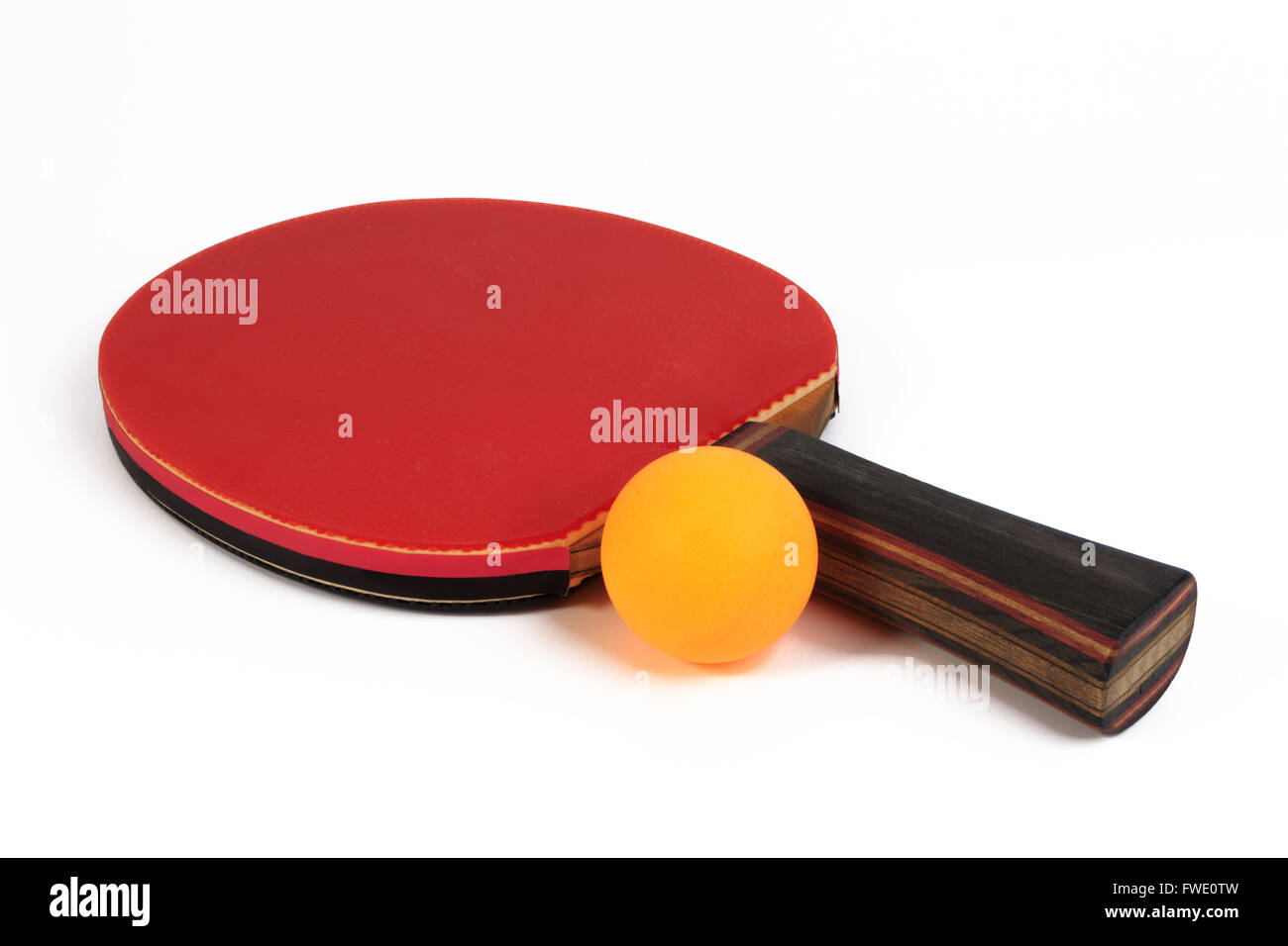 Used racket and ball for playing table tennis isolated on white ...