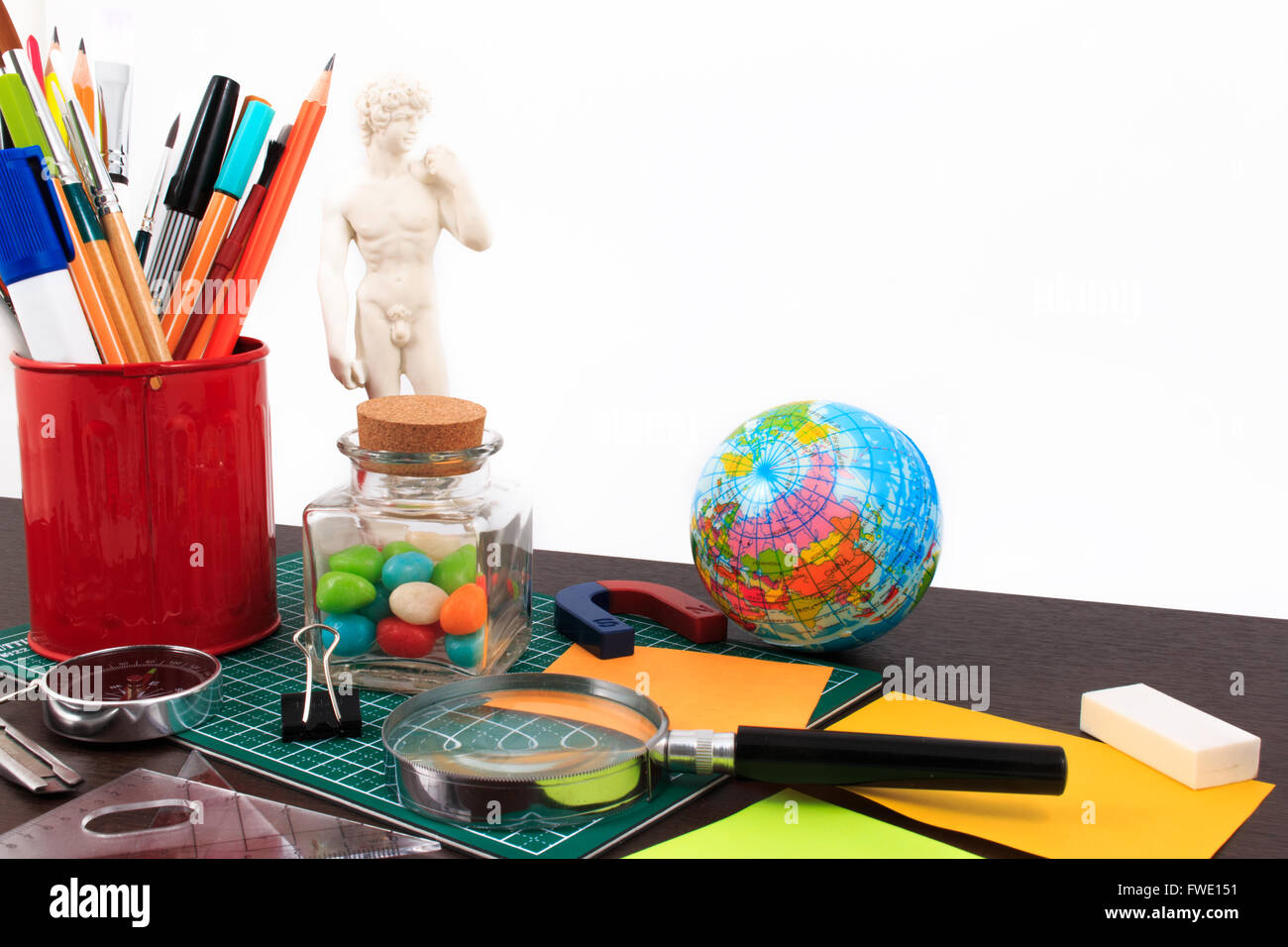 Artwork workplace with creative accessories, creative art work on a ...