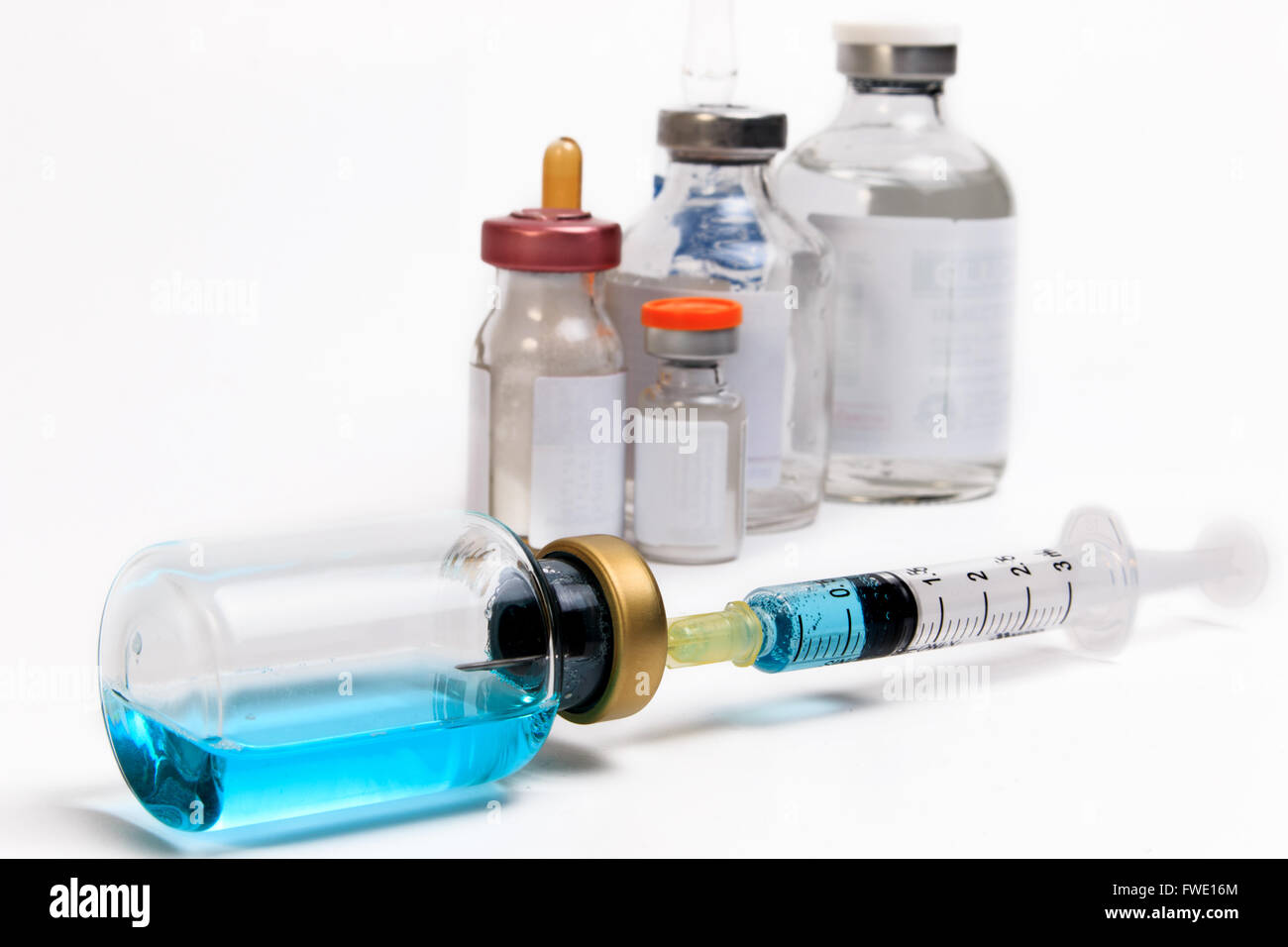 Vaccine in vial with syringe on a white background. Close up Stock ...