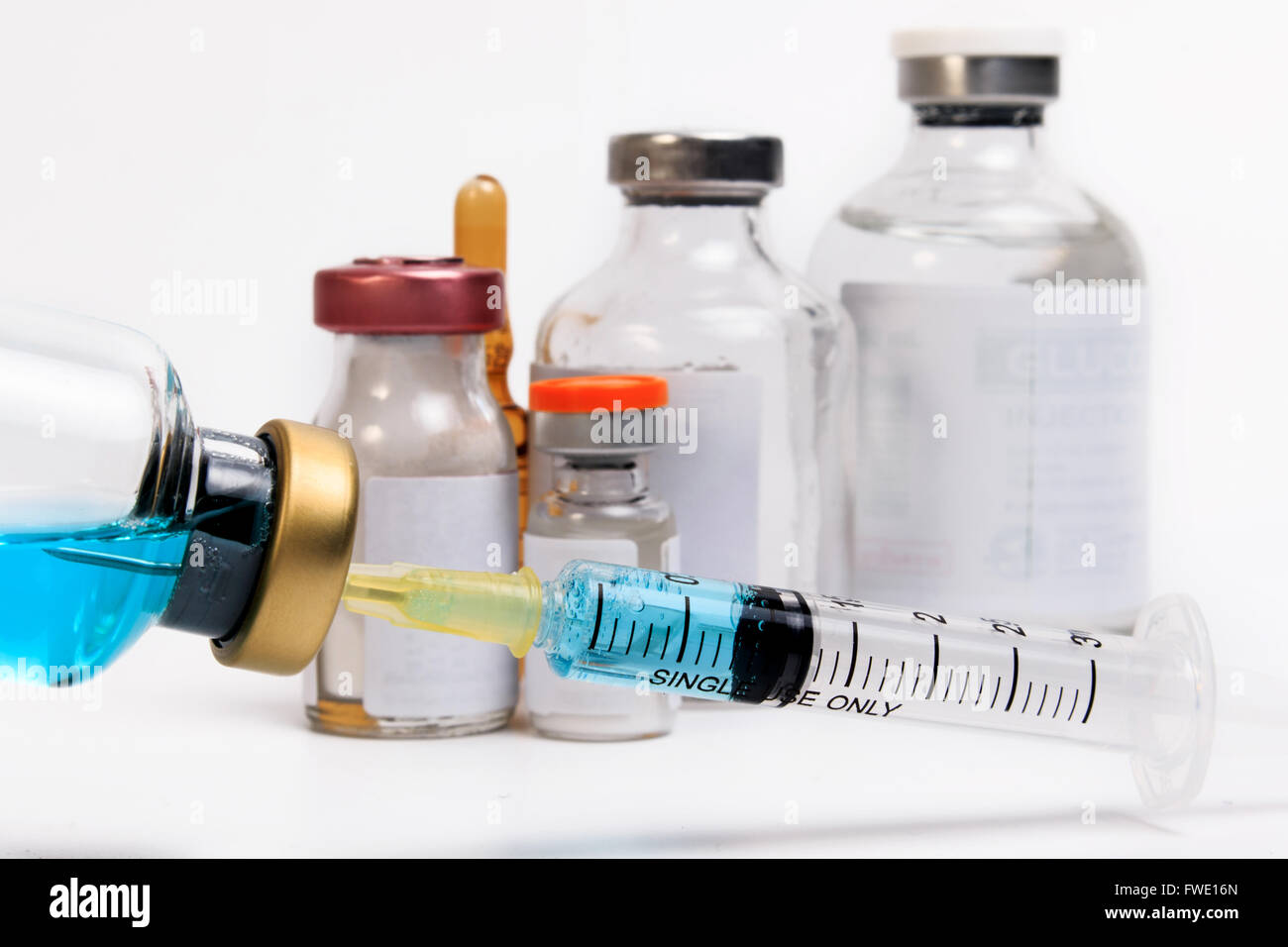 Vaccine in vial with syringe on a white background. Close up Stock ...
