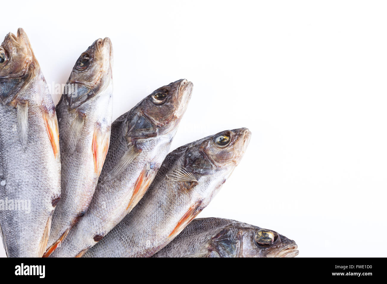 dried fish isolated on a white background Stock Photo - Alamy