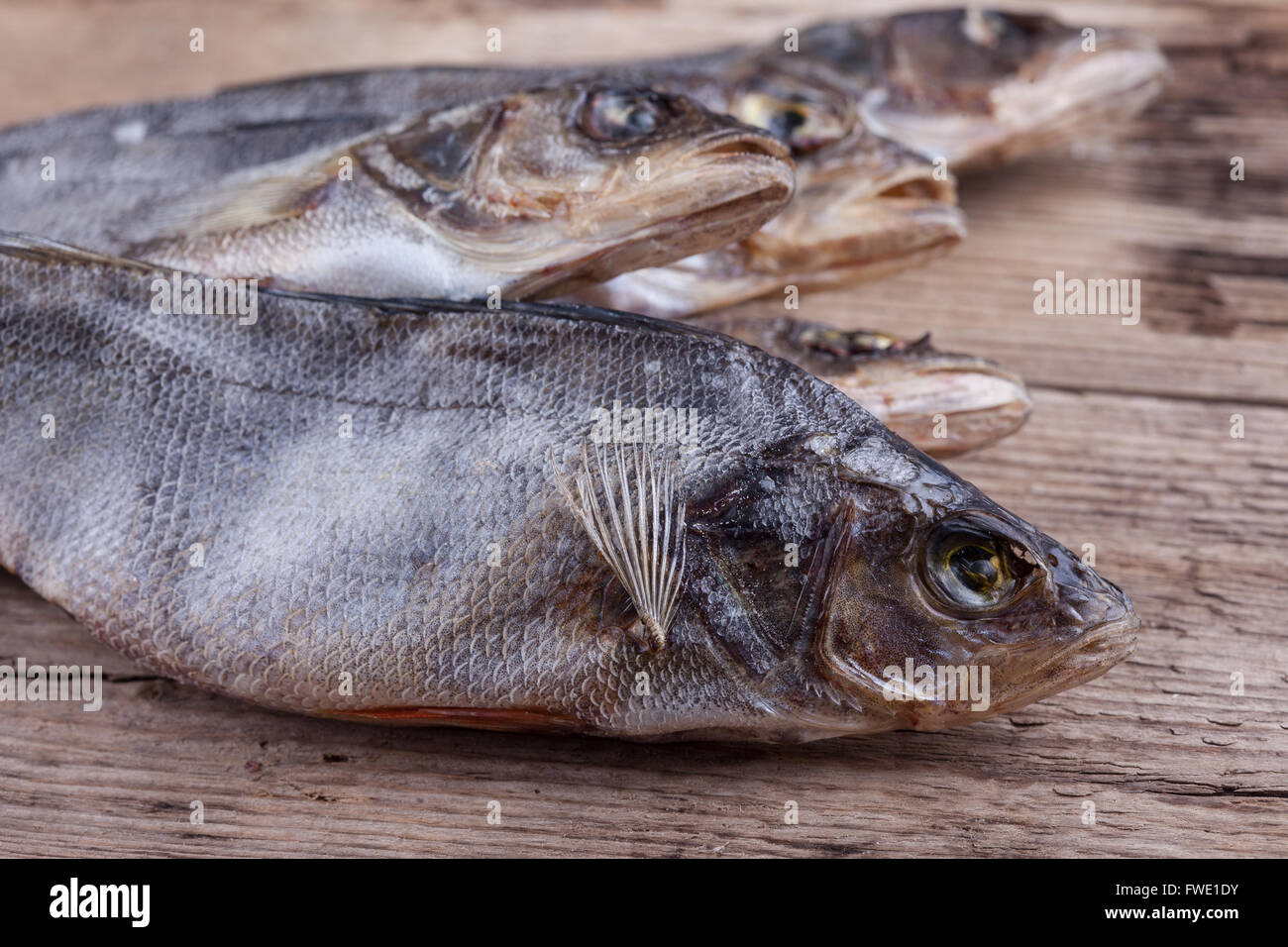 dried fish on the table Stock Photo - Alamy