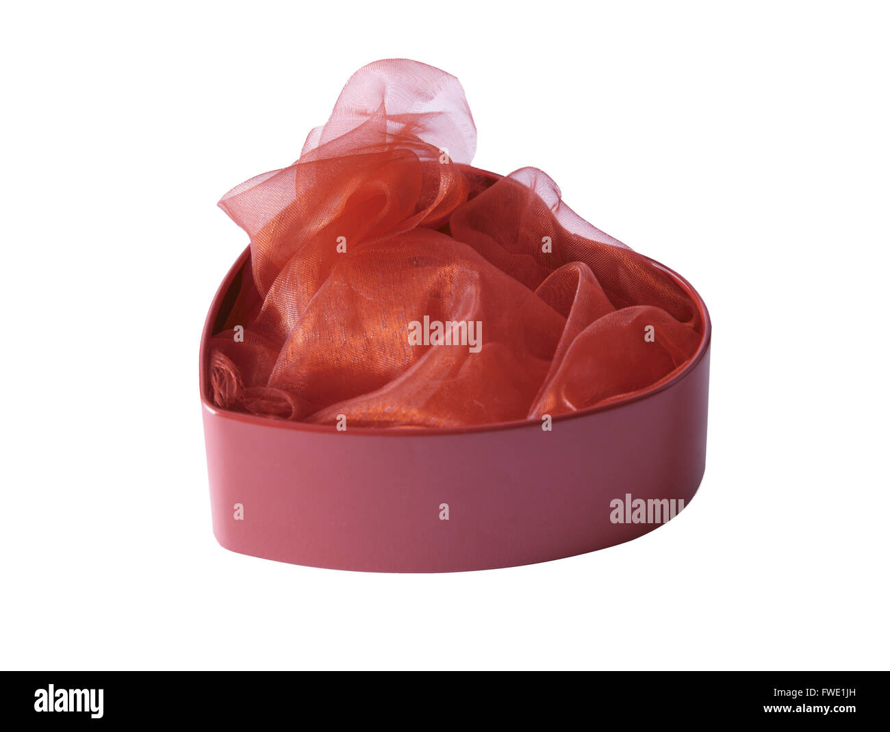 Heart-shaped red metal box filled with red piece of transparent folded ...