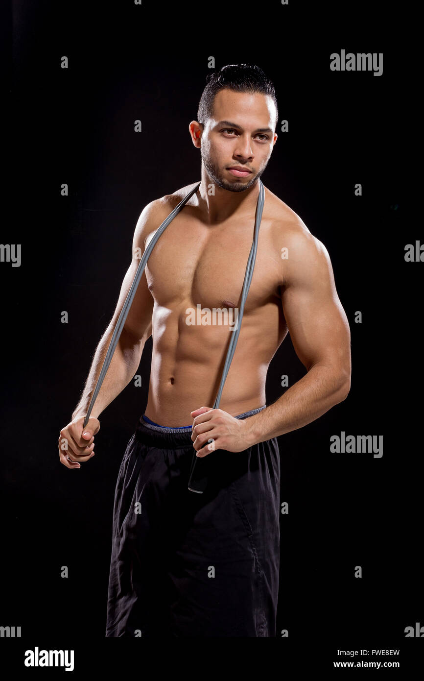 Handsome Muscular Man With Jumping Rope - Cardio Time Stock Photo - Alamy